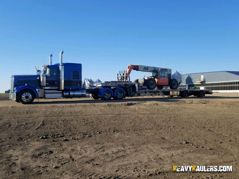 How to Load a Boom Lift Onto a Trailer | Heavy Haulers