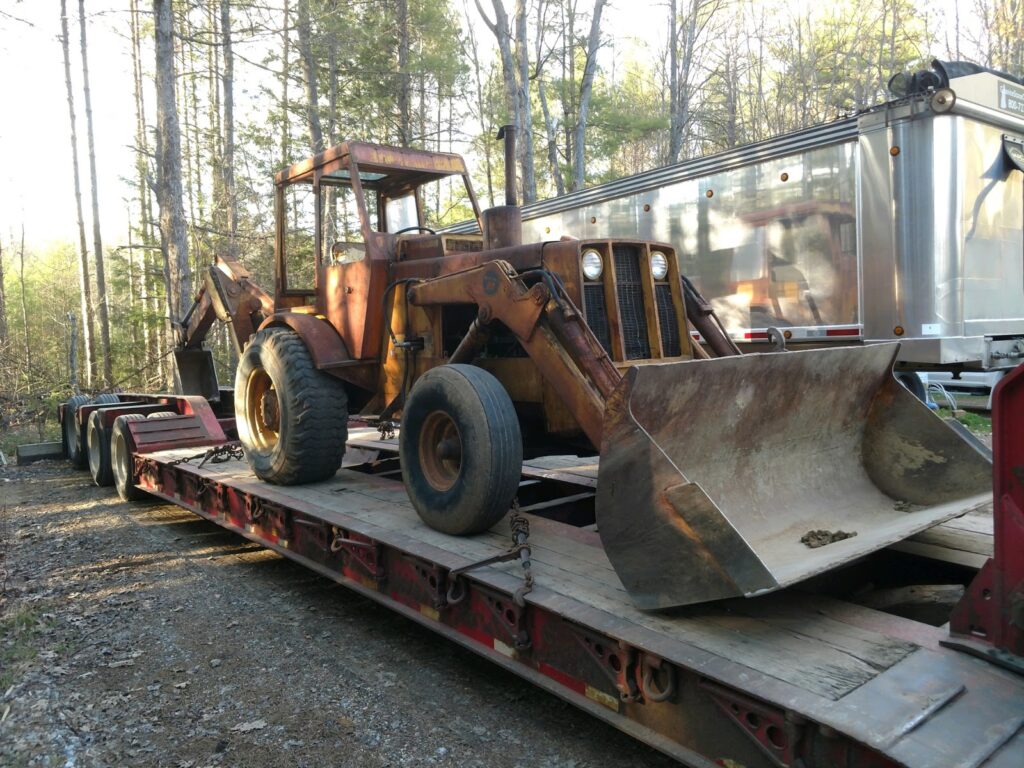 Transporting a CAT 450 Backhoe - Heavy Haulers BlogHeavy Haulers Blog